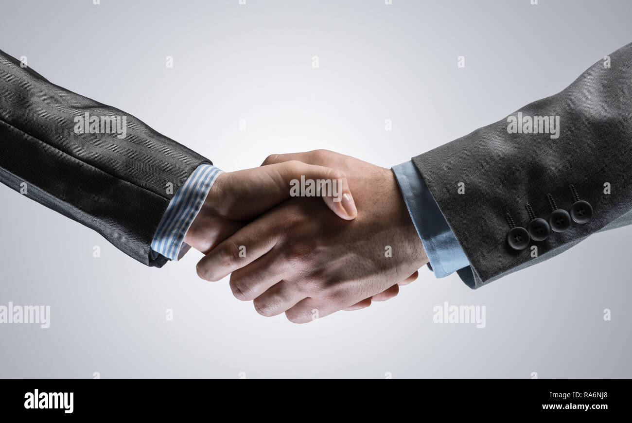 Business handshake as idea for unity and cooperation or greeting Stock ...