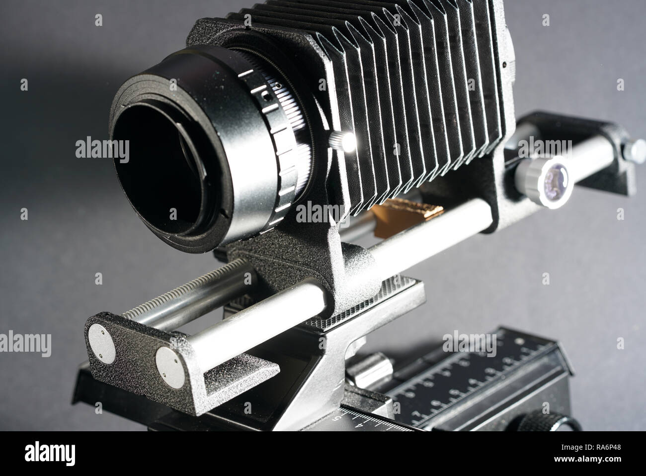 In macro photography and photomicrography, a bellows device is very ...