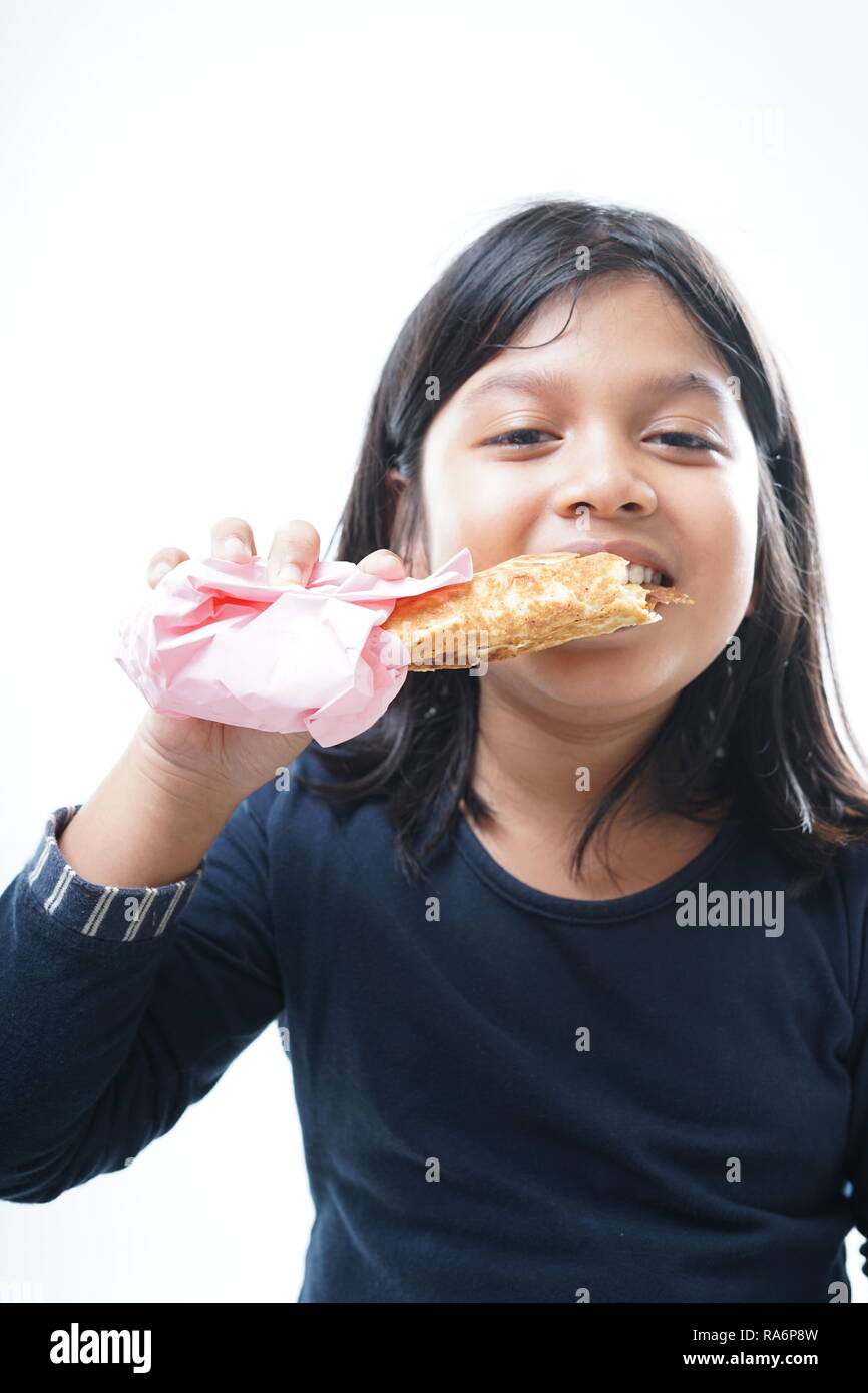Young Girl eating kebab or shawarma Stock Photo - Alamy