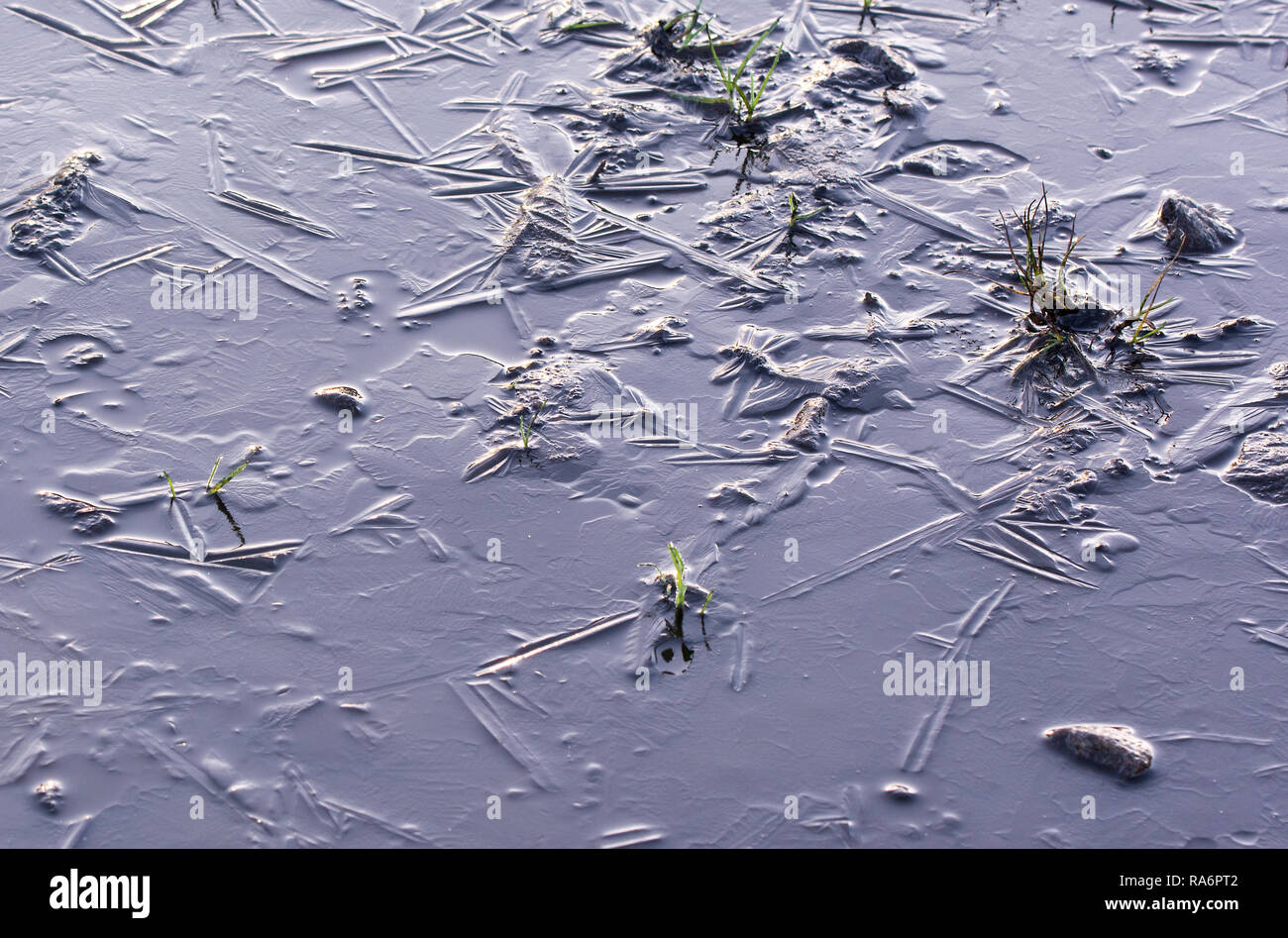Frozen over water Stock Photo - Alamy