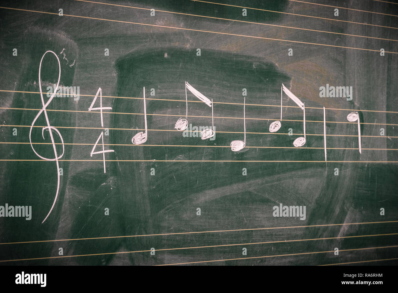 Random music notes written with white chalk on a blackboard Stock Photo ...