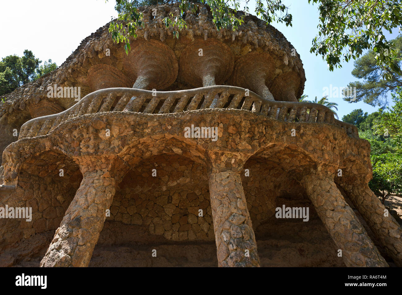 Stoney arches and building designed by Antoni Gaudi at the Park Guell ...
