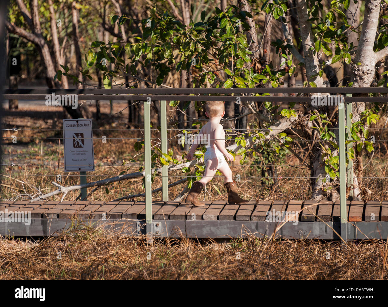 Outback child walking the path, Northern Territory Australia Stock ...