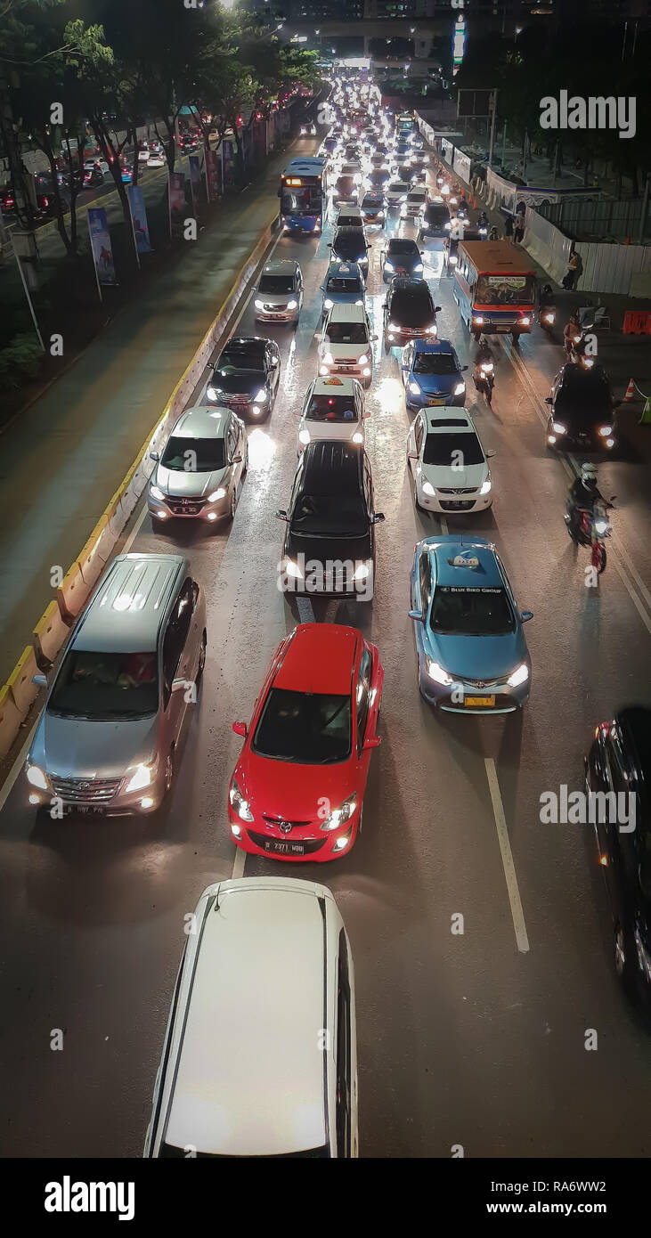 the road jammed with vehicles in the photos at night over the crossing ...