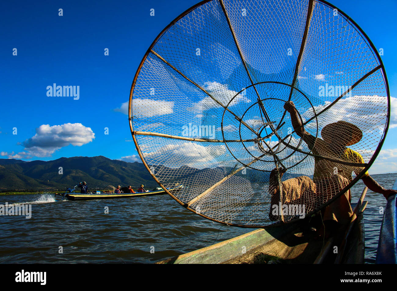 Inle fisherman and fishing tool in Inle lake Myanmar (Burma Stock Photo ...