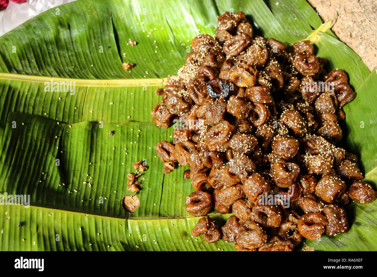 Traditional Myanmar sweet dessert on banana leaves in one of the ...