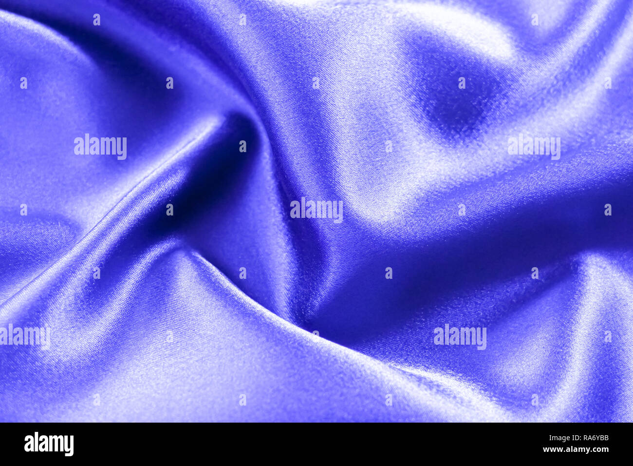 Smooth elegant wavy blue silk or satin luxury cloth fabric texture ...