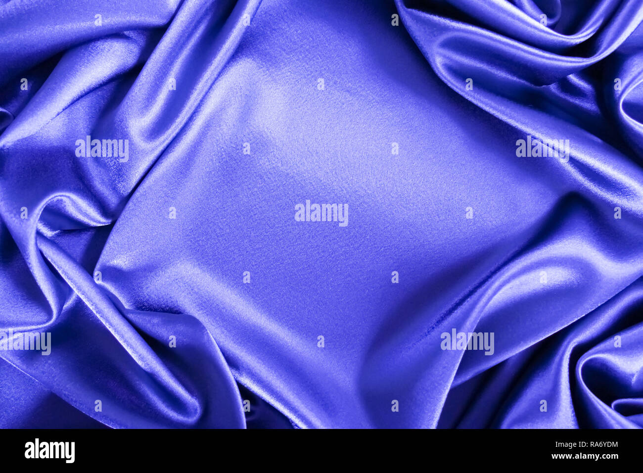Smooth elegant wavy blue silk or satin luxury cloth fabric texture ...