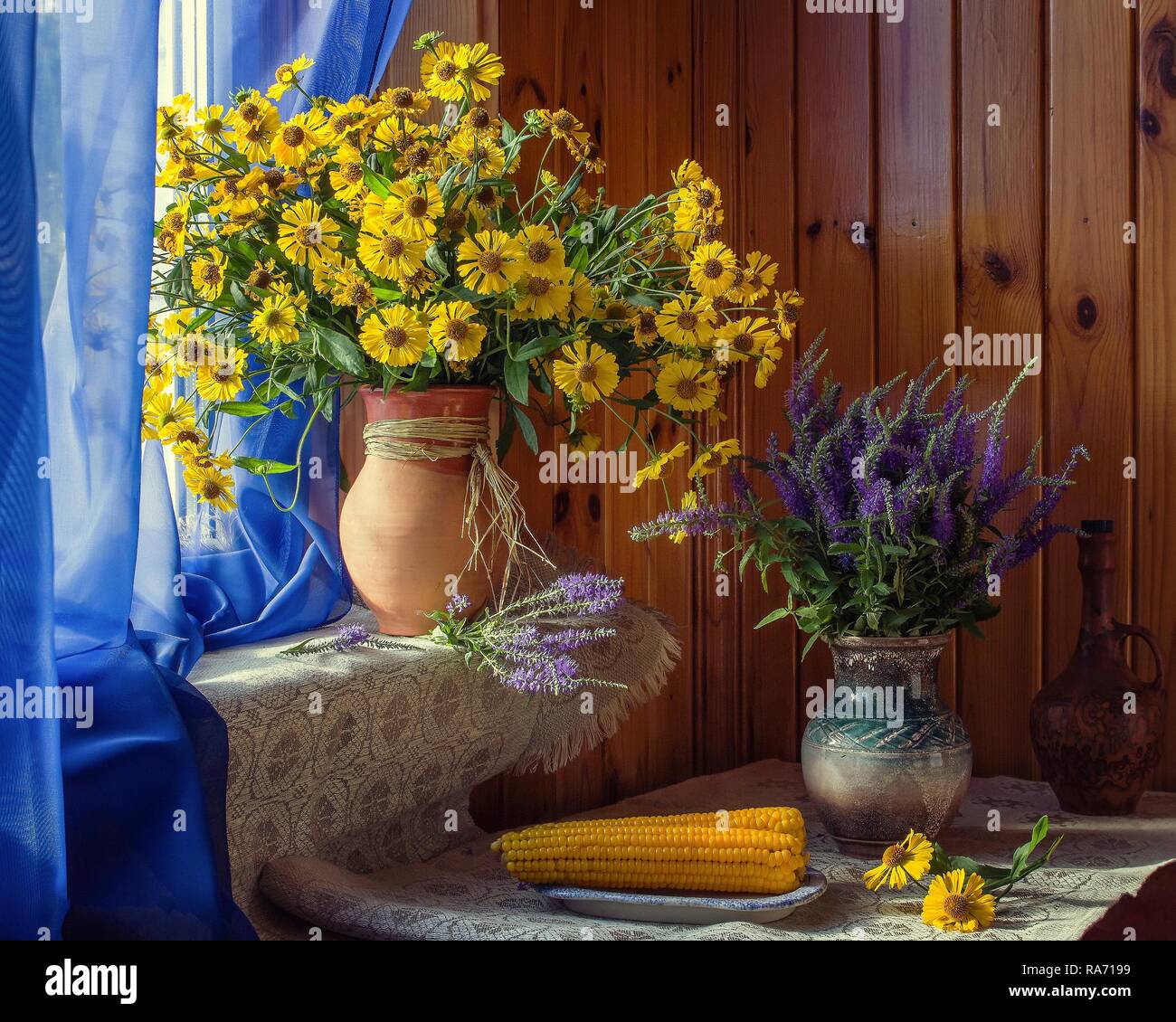 Still life with bouquet of yellow flowers Stock Photo - Alamy