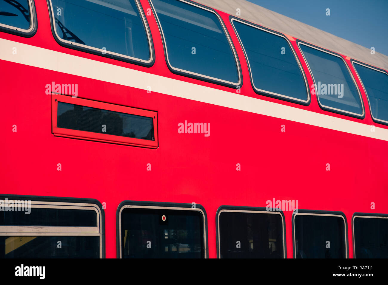 Red double decker commuter train carriage Stock Photo - Alamy