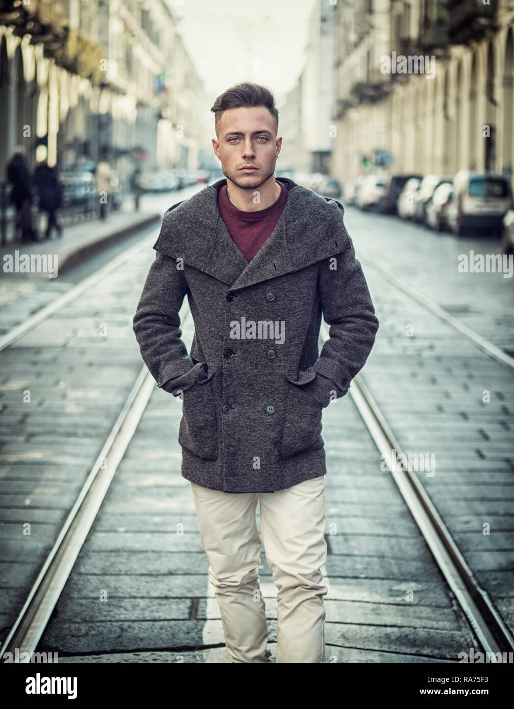 Man standing in middle street hi-res stock photography and images - Alamy