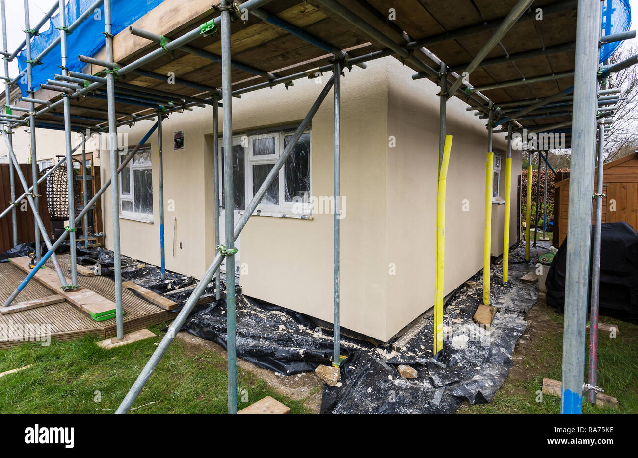 Self Coloured house rendering and Insulation of Stock Photo - Alamy