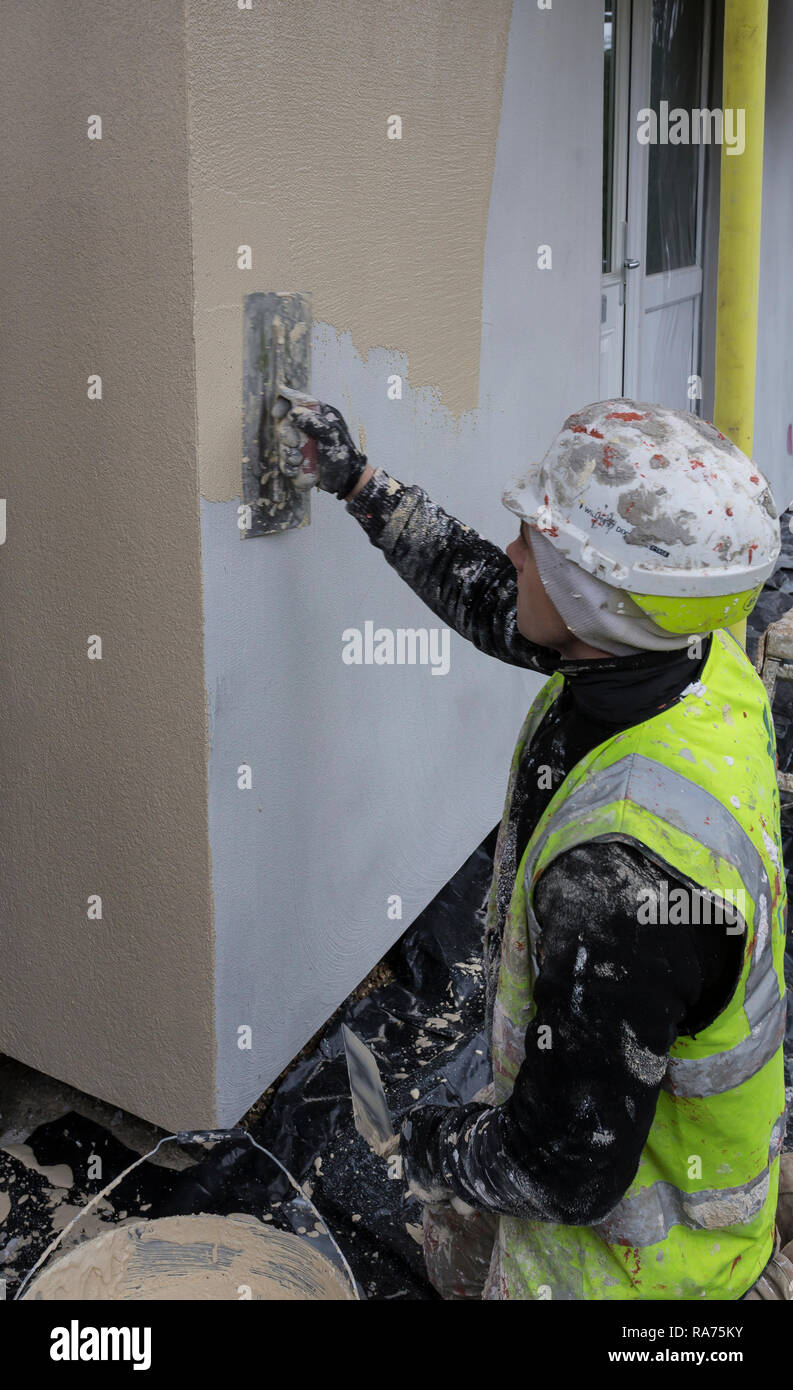 Self Coloured house rendering and Insulation of Stock Photo - Alamy
