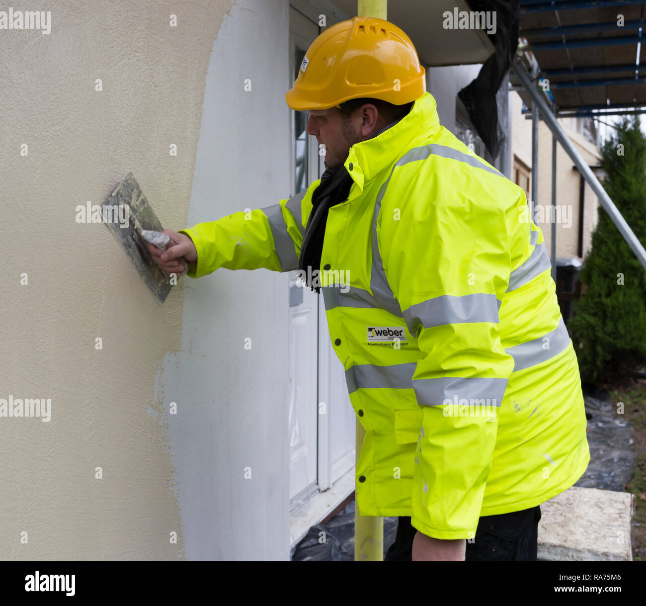Self Coloured house rendering and Insulation of Stock Photo - Alamy