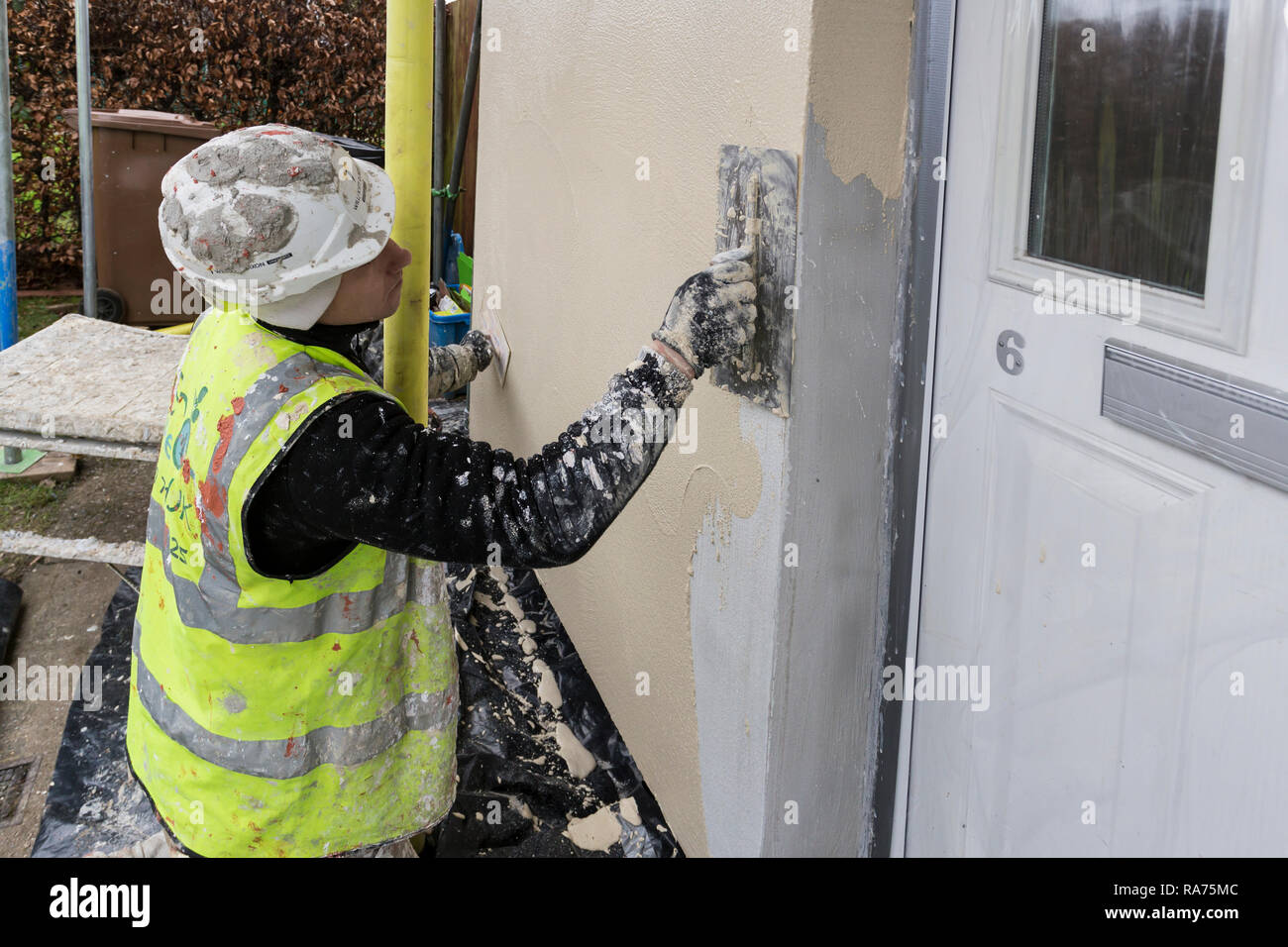 Self Coloured house rendering and Insulation of Stock Photo - Alamy