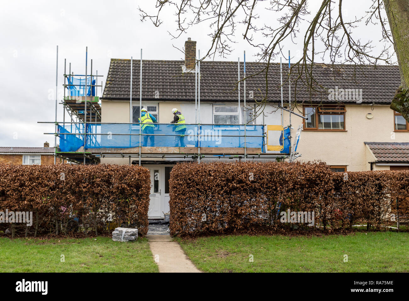 Self Coloured house rendering and Insulation of Stock Photo - Alamy