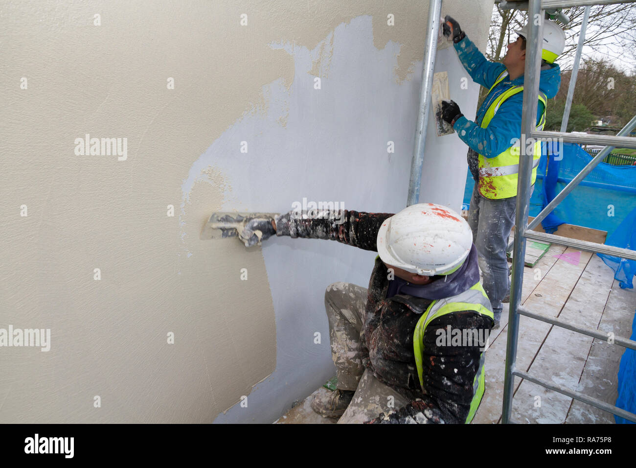 Self Coloured house rendering and Insulation of Stock Photo - Alamy