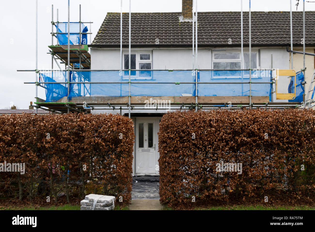 Self Coloured house rendering and Insulation of Stock Photo - Alamy