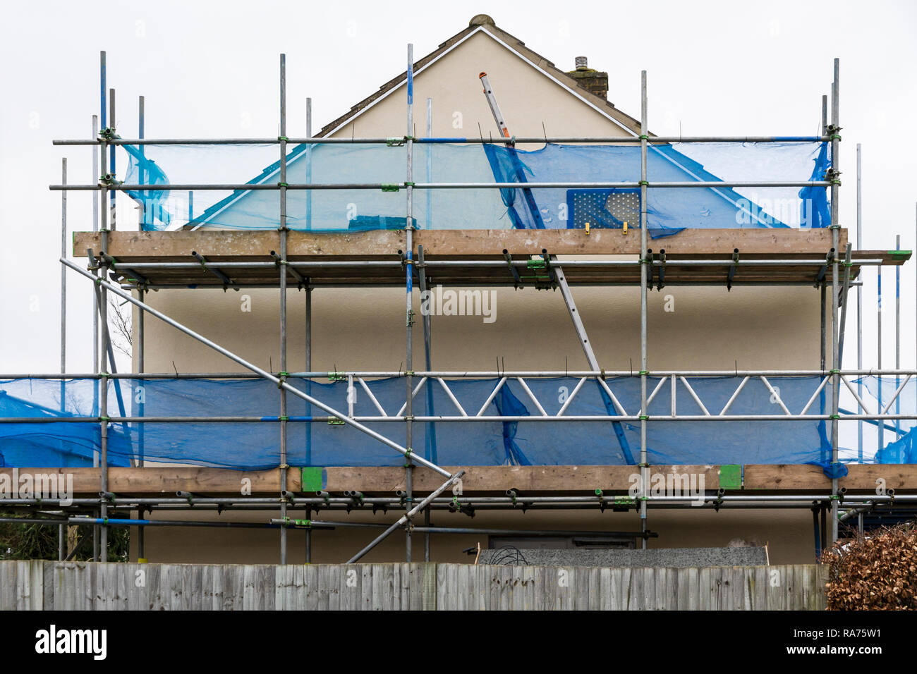 Self Coloured house rendering and Insulation of Stock Photo - Alamy
