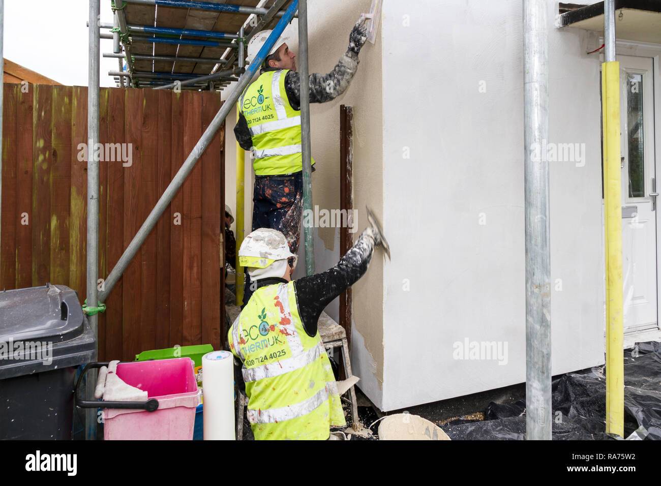 Self Coloured house rendering and Insulation of Stock Photo - Alamy