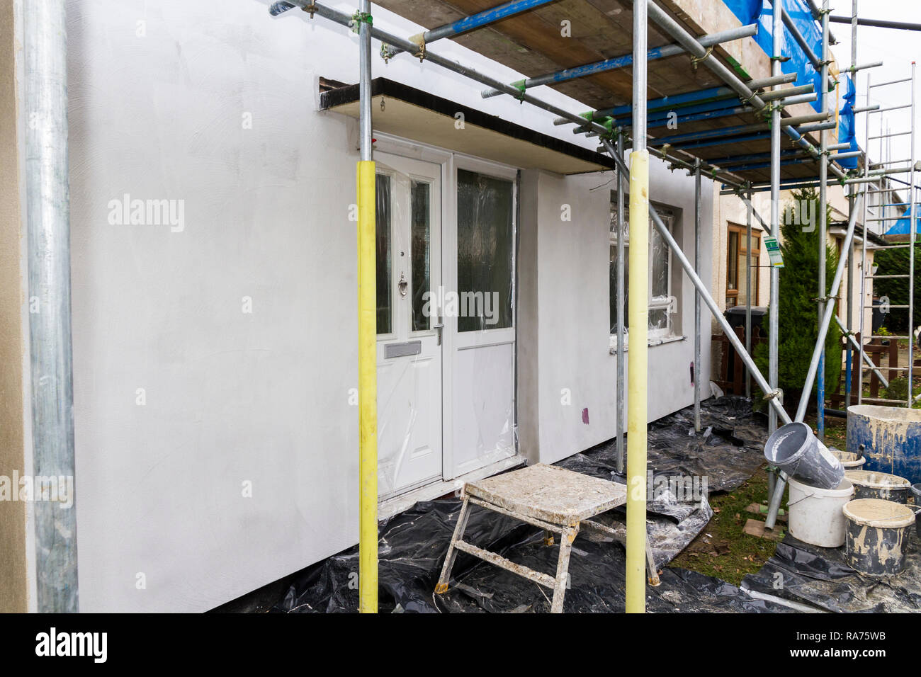 Self Coloured house rendering and Insulation of Stock Photo - Alamy
