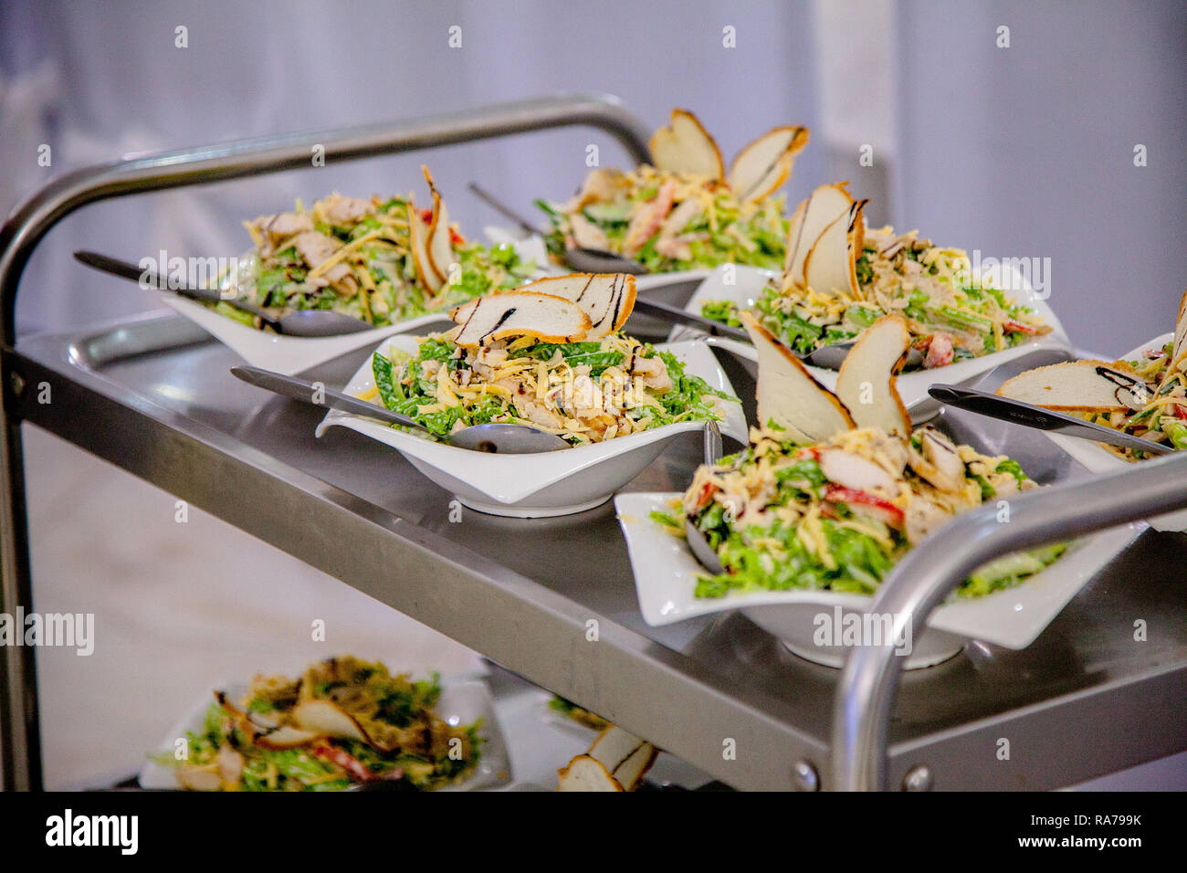 Salads on a cart for spreading close-up Stock Photo - Alamy