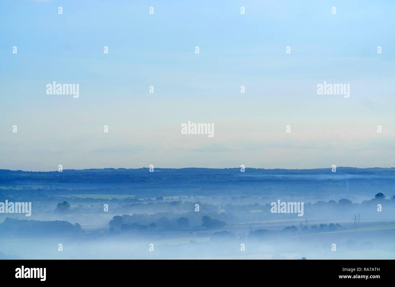 Low lying mist over the English countryside, East Sussex Stock Photo ...