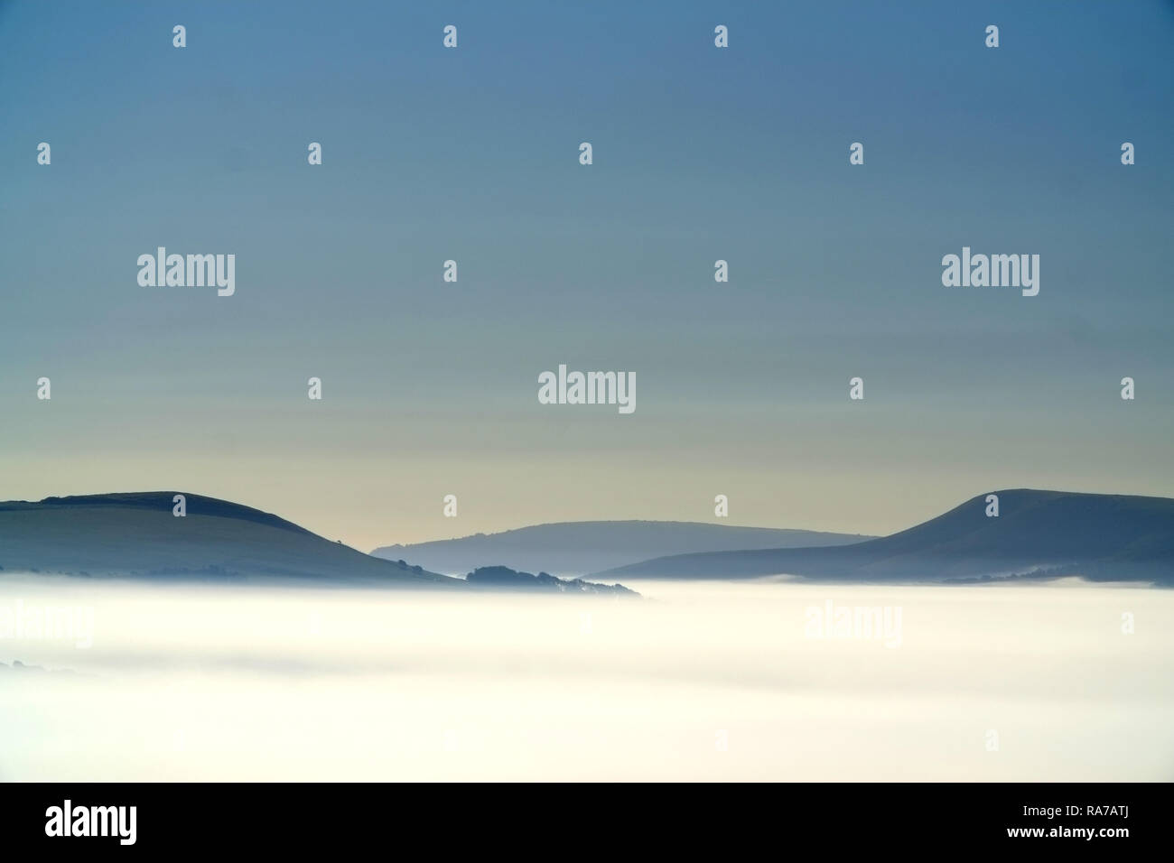 Low lying mist in valleys below the South Downs National Park near ...