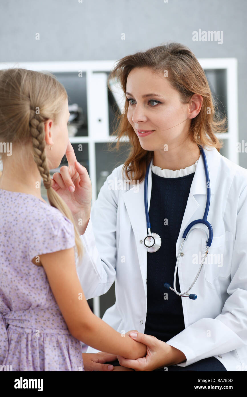 Little child at pediatrician reception Stock Photo - Alamy