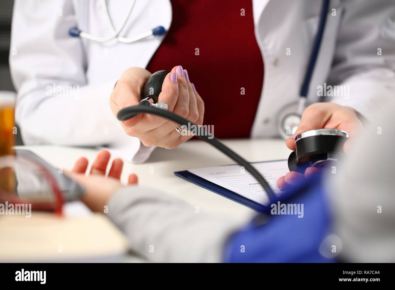 Female doctor arms make medic procedure closeup Stock Photo - Alamy