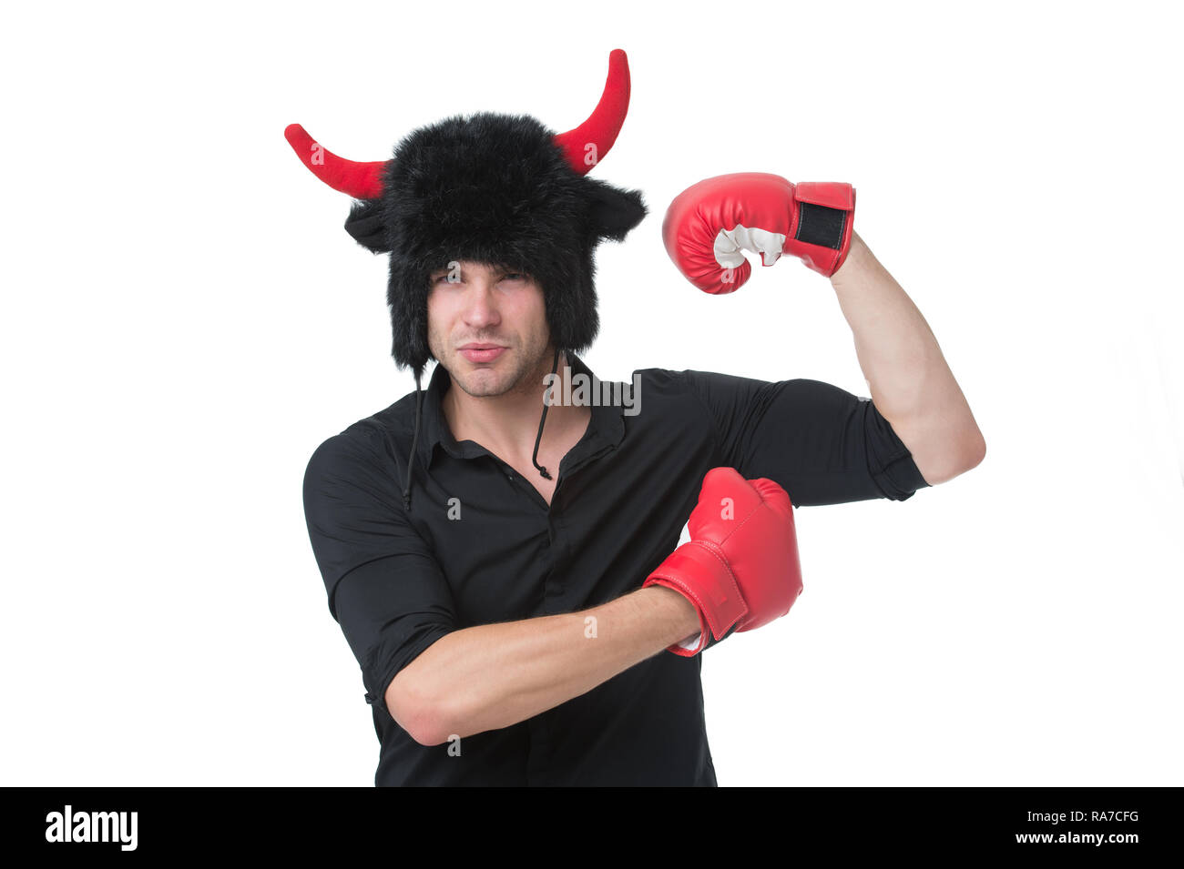 Animal power. Masculinity concept. Man with horns as devil or bull wear ...