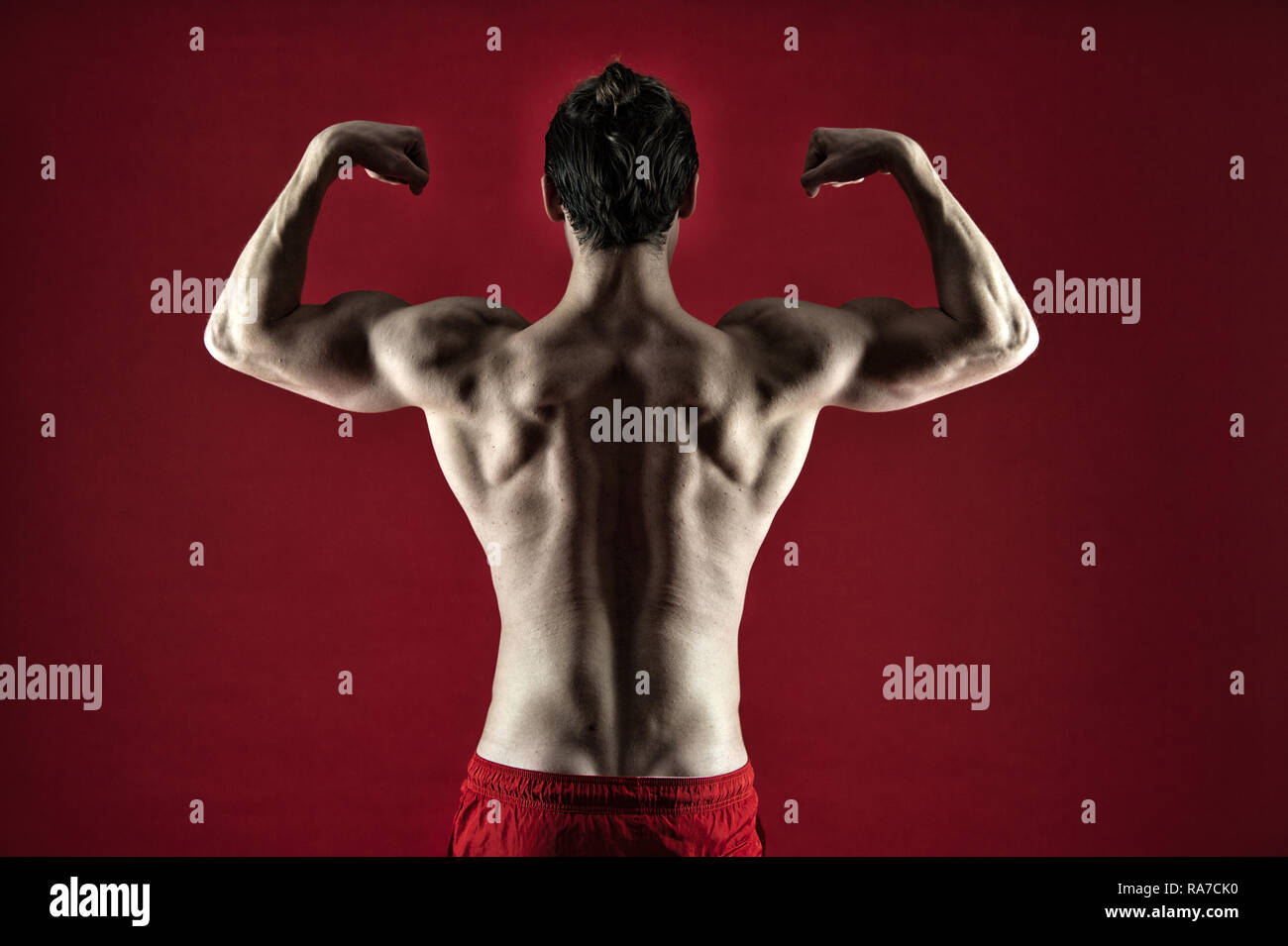 Attractive guy muscular back. Proud of excellent shape. Muscular ...