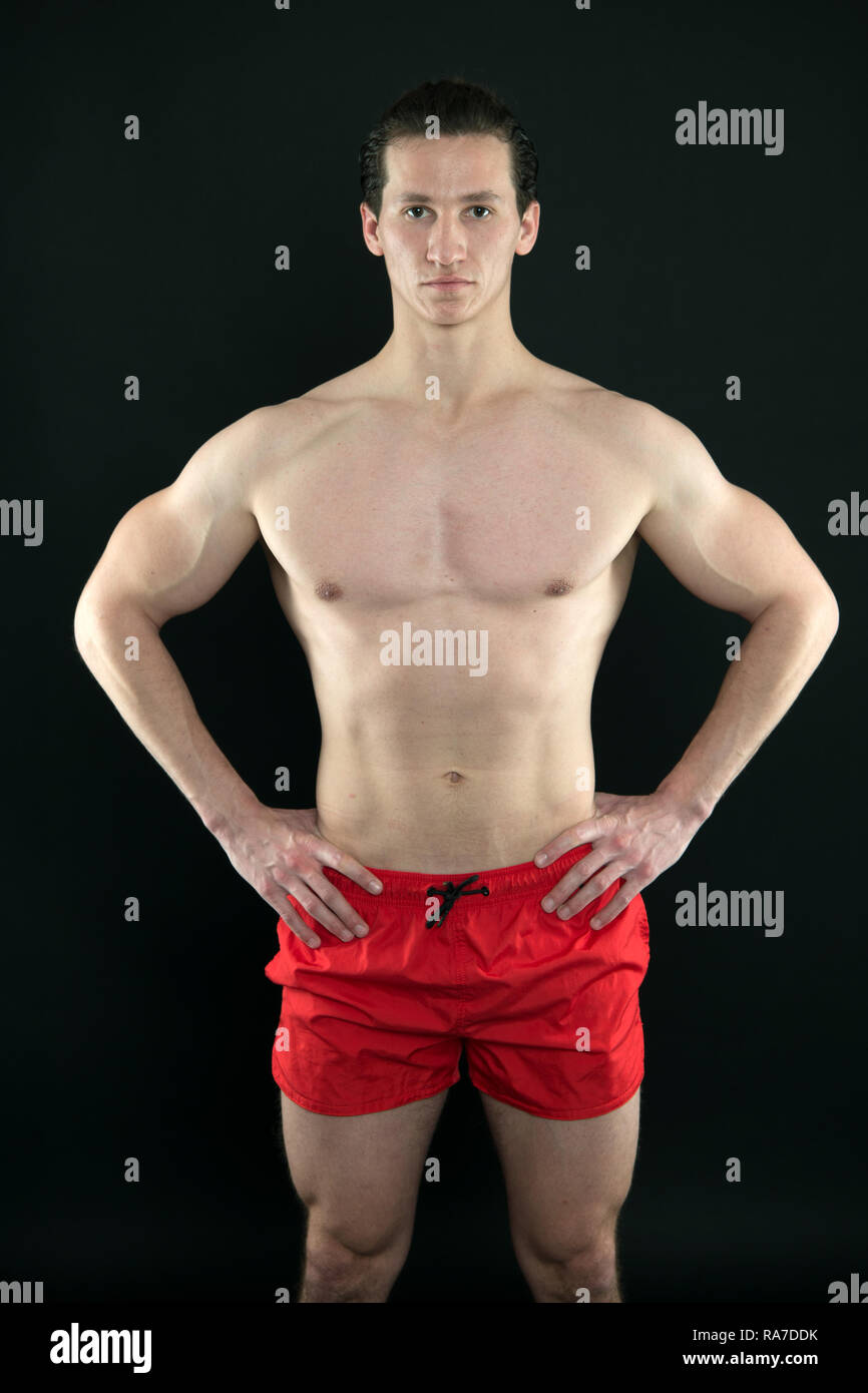 Man muscular athlete stand confidently. Healthy and strong. Improve ...