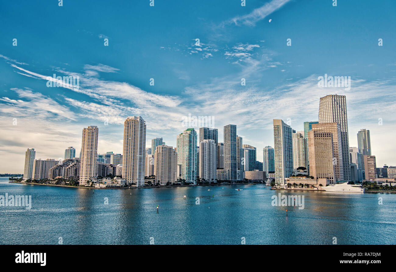 Miami skyline skyscrapers ,yacht or boat sailing next to Miami downtown ...