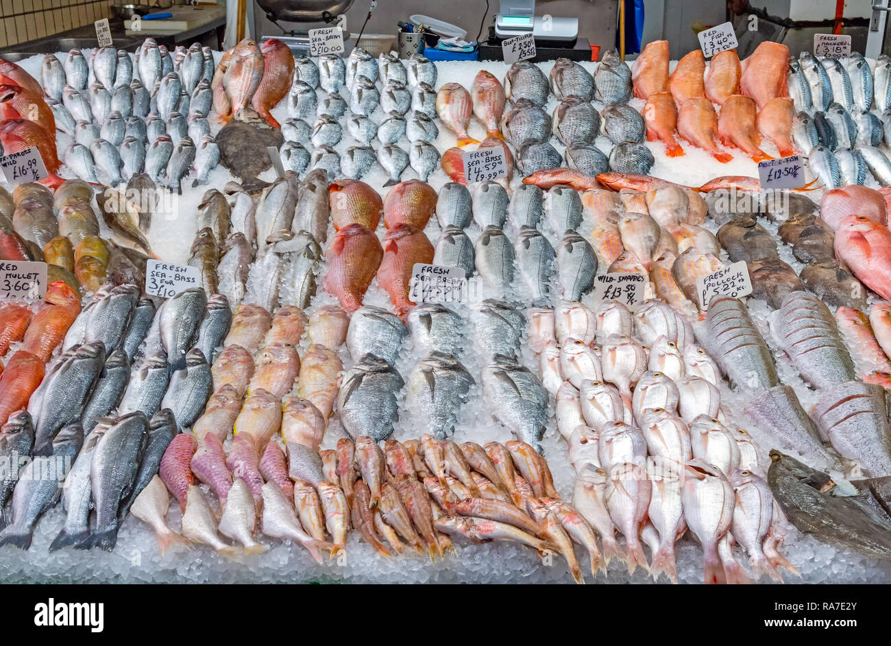 Great choice of fresh fish for sale at a market in Brixton, London ...