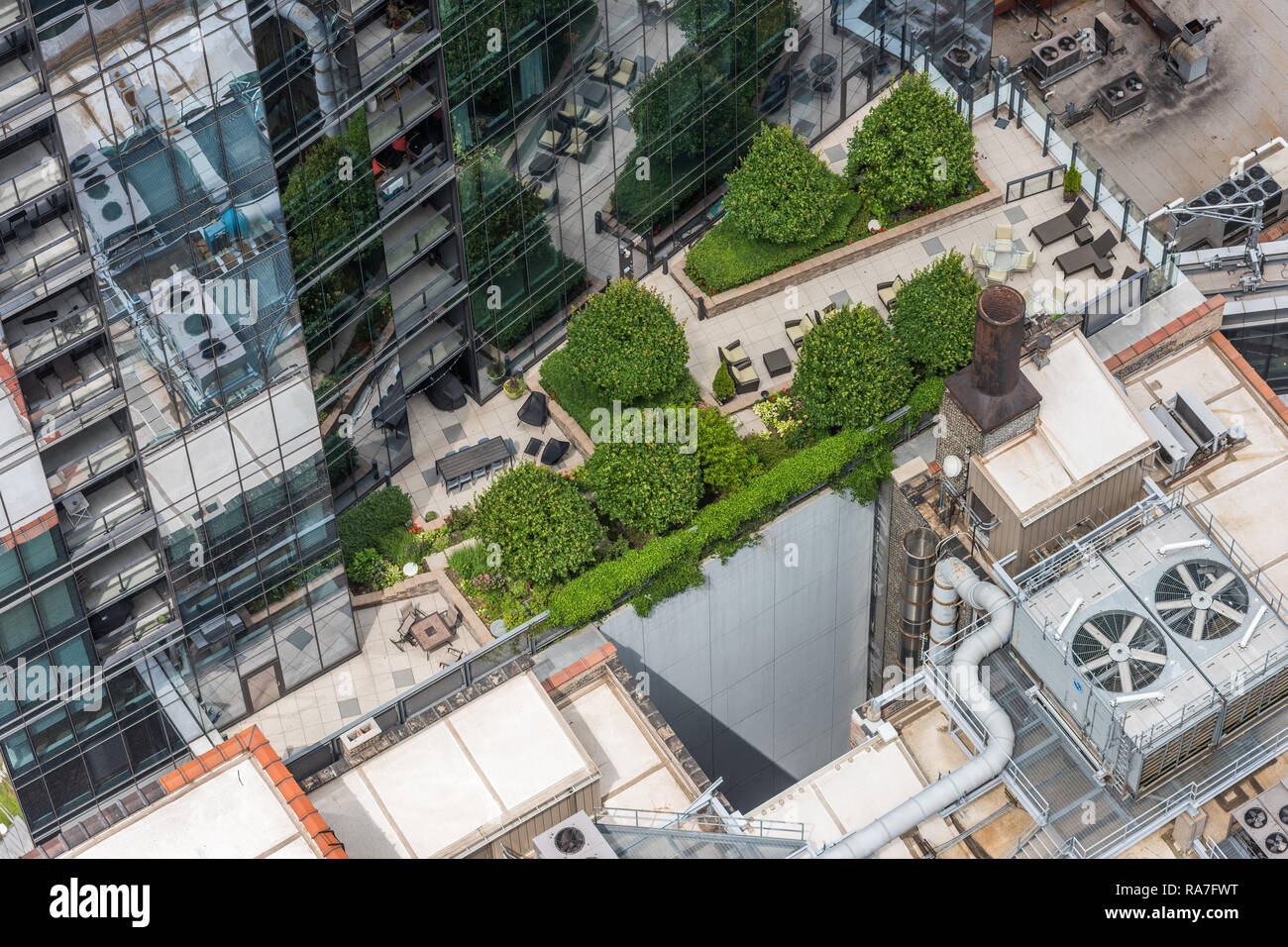 Aerial view looking down at terrace and mechanicals of building in ...