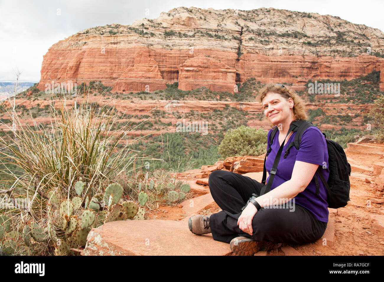 Woman Hikerresting Along The Trail To Devils Bridge In Sedona Arizona
