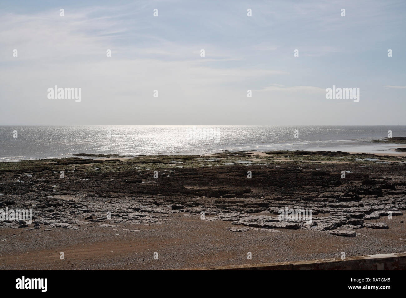 Sunlight reflects on the sea, at Porthcawl Wales UK, Welsh Coast ...