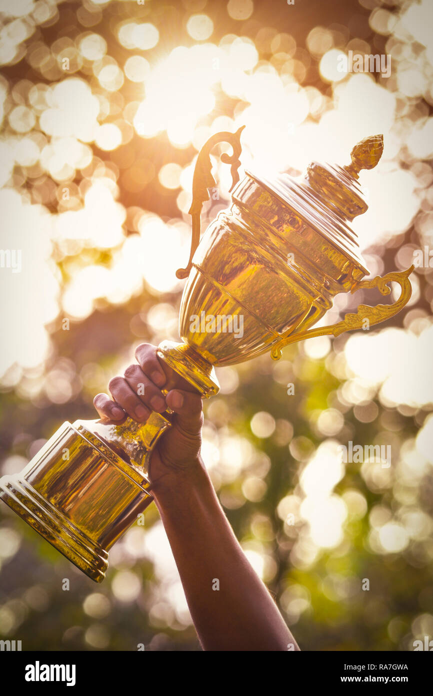 Golden trophy cup ribbon hi-res stock photography and images - Alamy