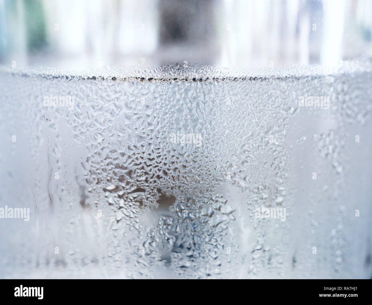 Close-up water drop texture on cold drinking water on cooler background ...