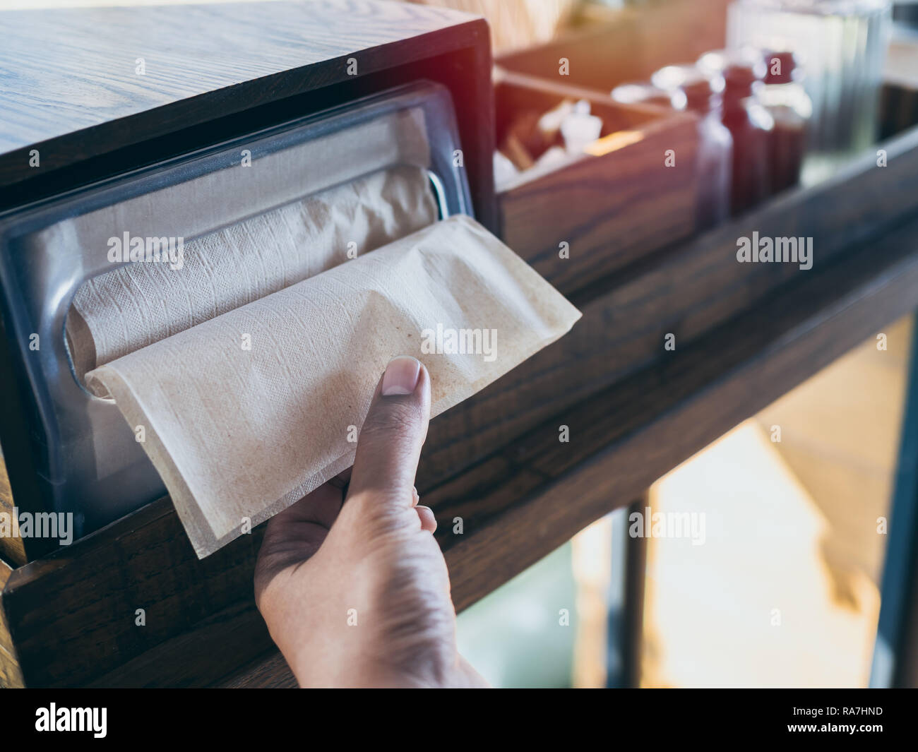Hand picking up paper hi-res stock photography and images - Alamy