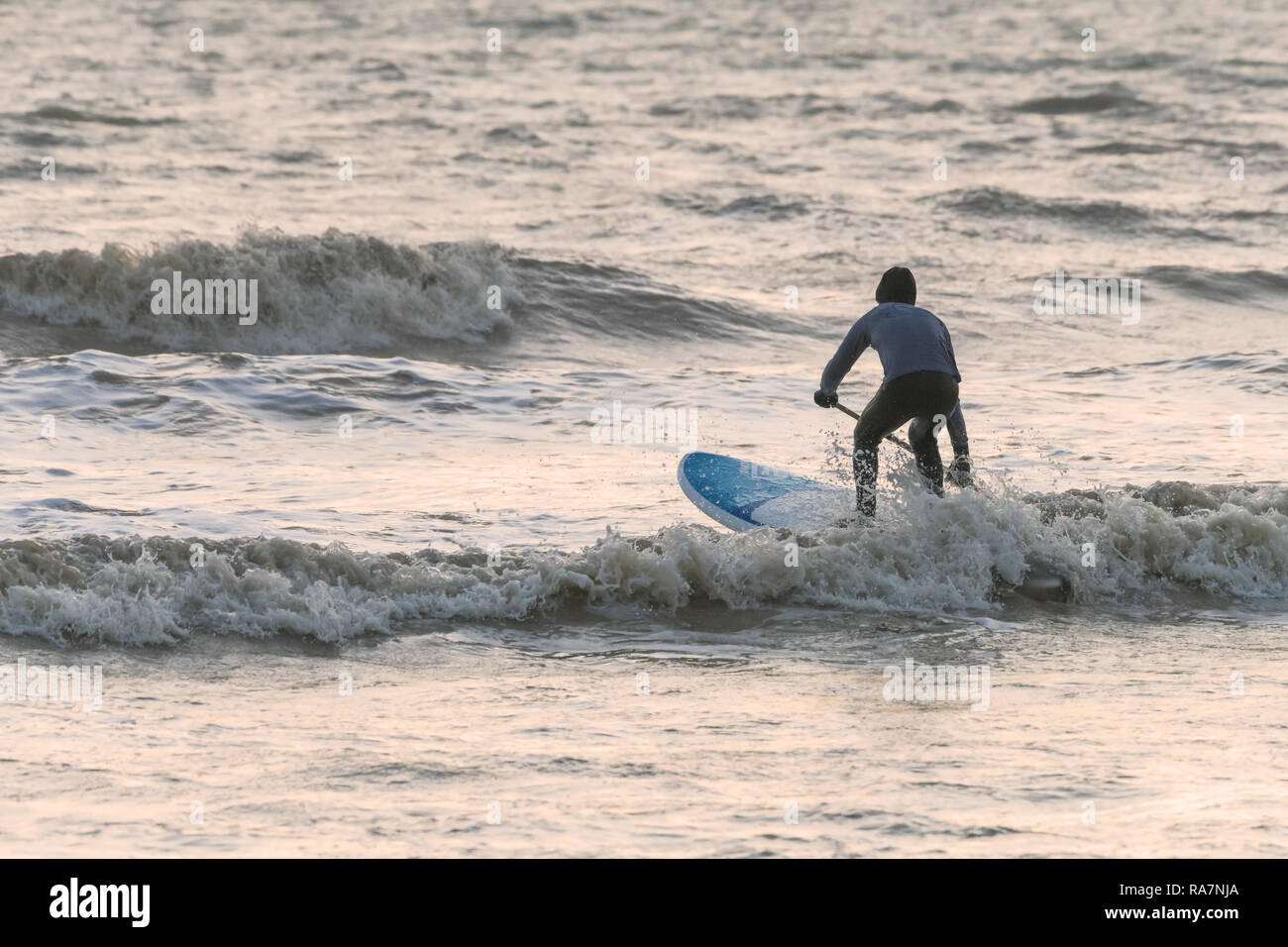 Play surfing at the sea Stock Photo - Alamy