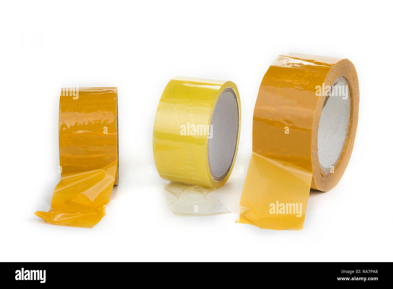 Three rolls of scotch tape on a white Stock Photo - Alamy