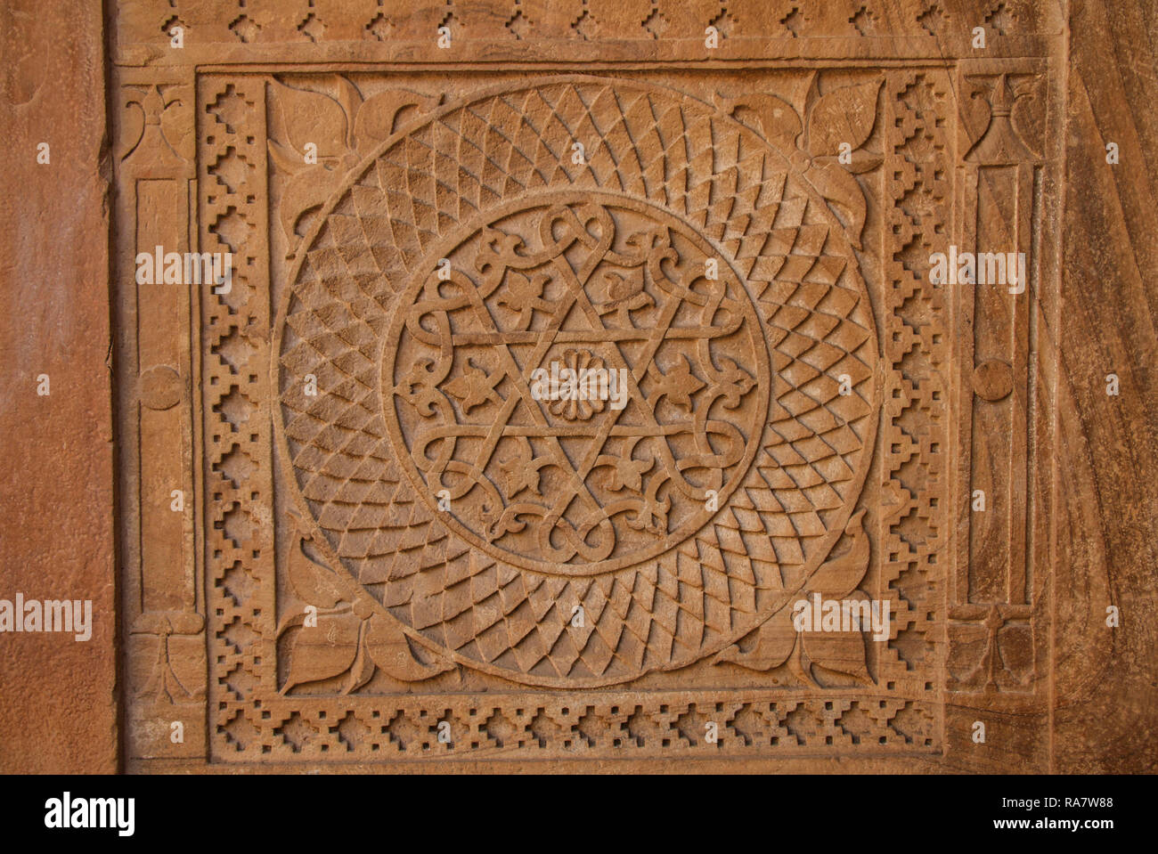 Stone carving in Indian style - geometric shapes, circle inside the ...