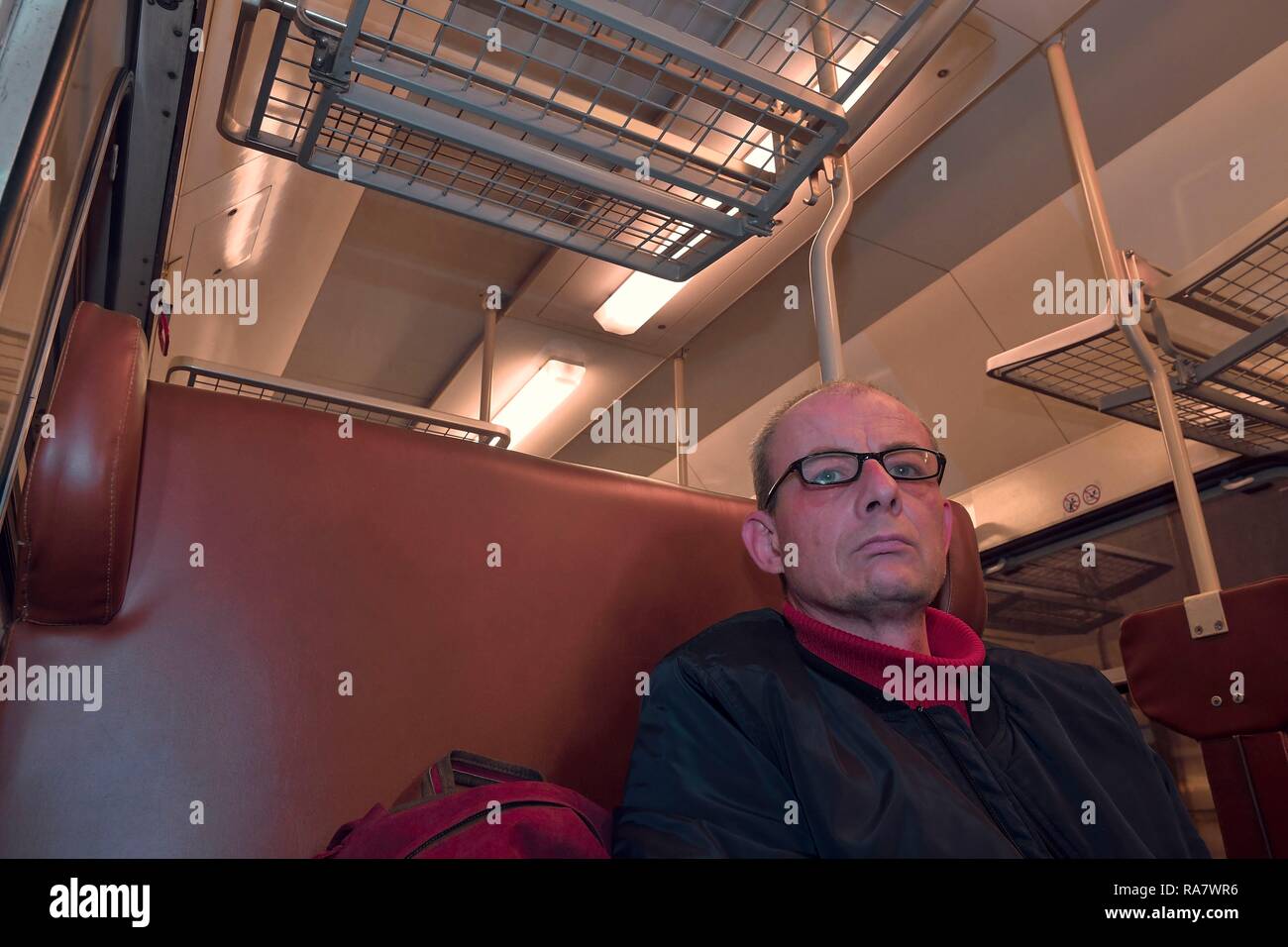 Elderly looking out train window hi-res stock photography and images ...