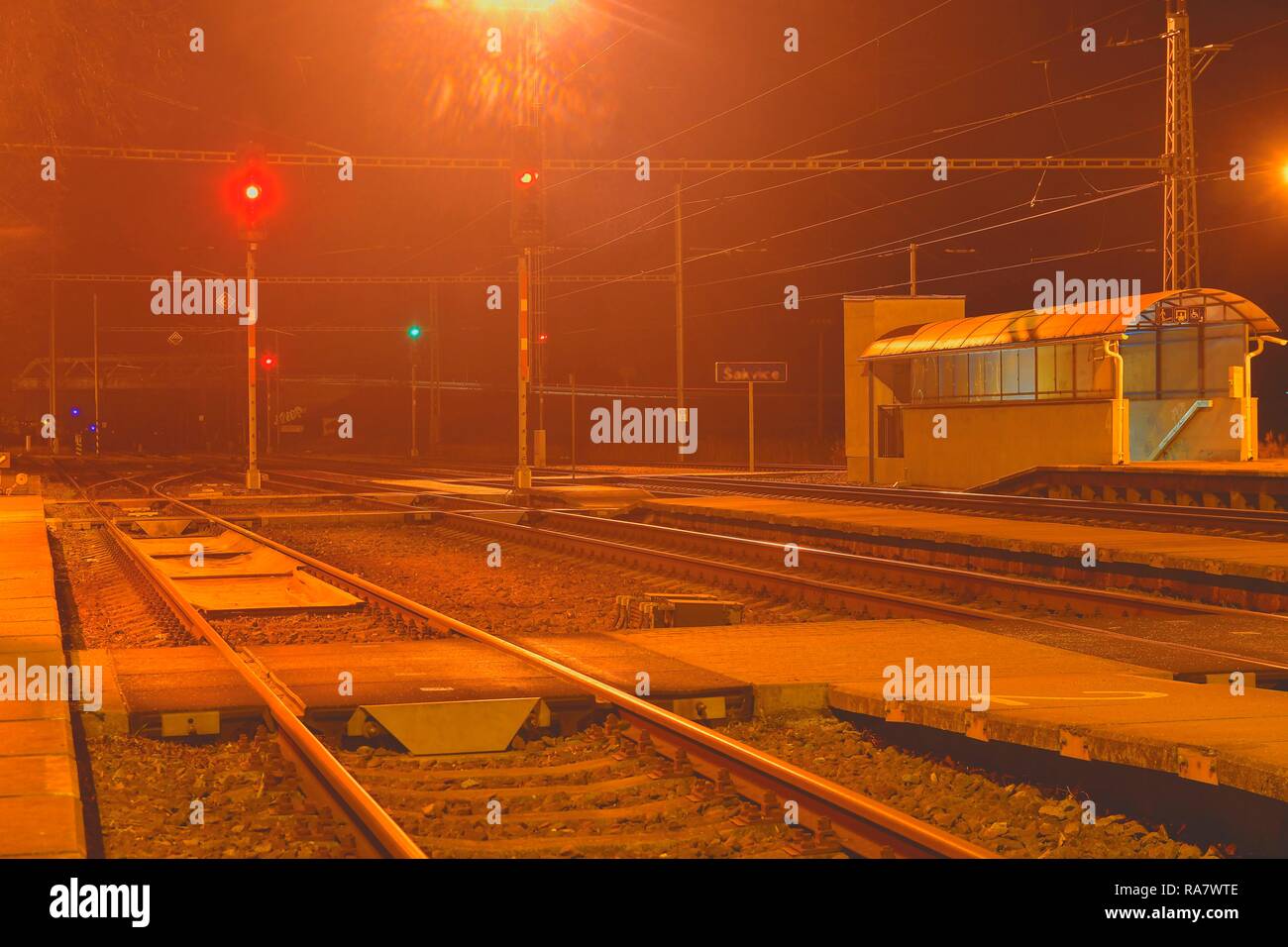 Speeding train at small station hi-res stock photography and images - Alamy
