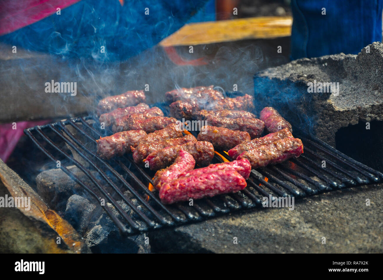 Bbq cevapi rostilj beef Bosnian food cooking on the grill Stock Photo ...