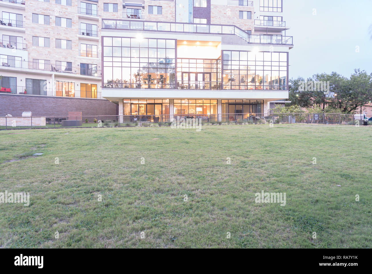 New development apartment building with large grass lawn Stock Photo ...