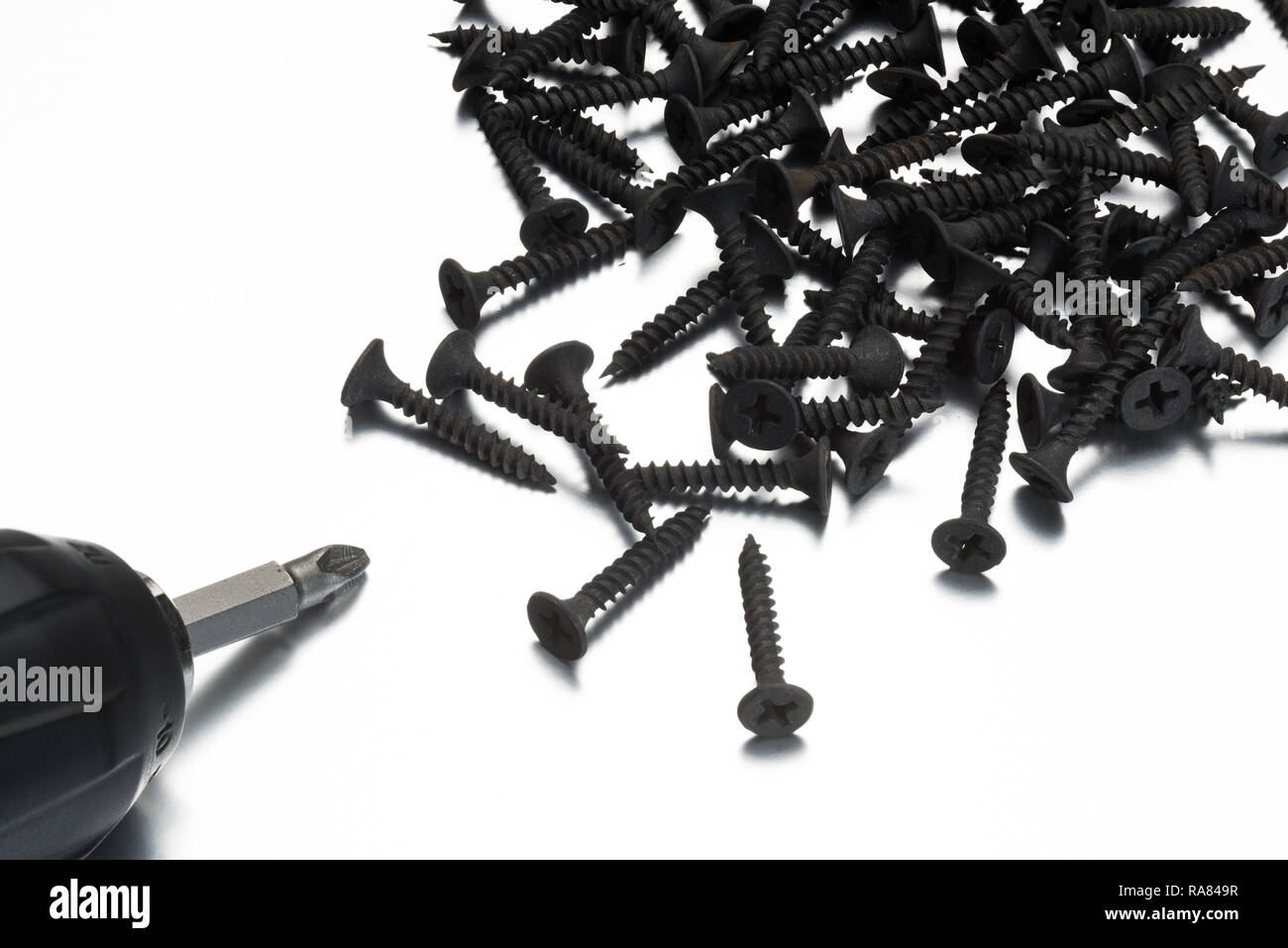 black screw on white background Stock Photo - Alamy