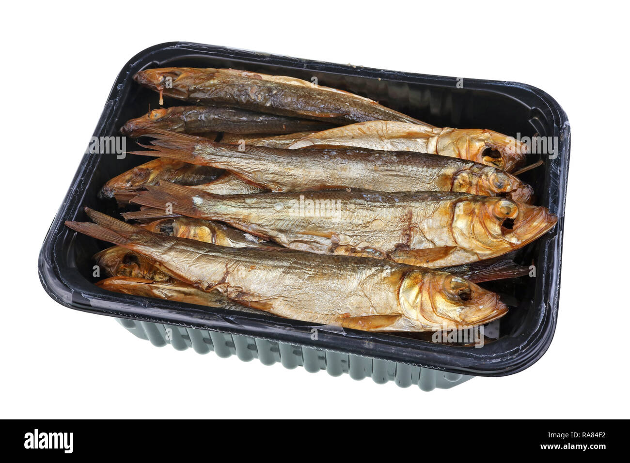 Hot whole smoked capelin saury sprat Baltic sea fish with heads and ...